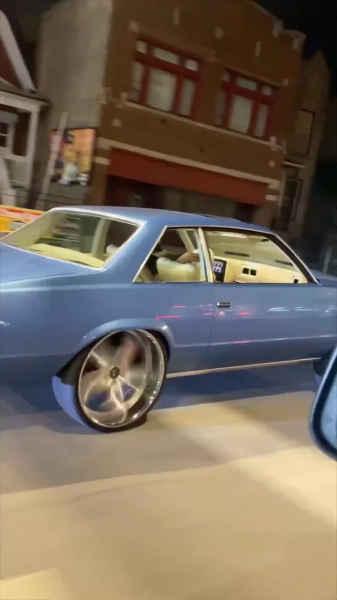 Chevy Malibu on 24’s choppin thru the streets