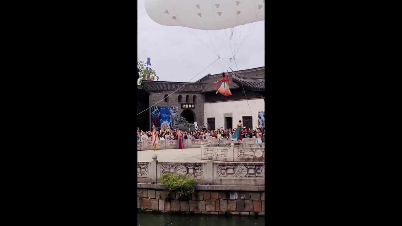 Performer Falls Into Lake After Balloon Malfunction During Aerial Show ...