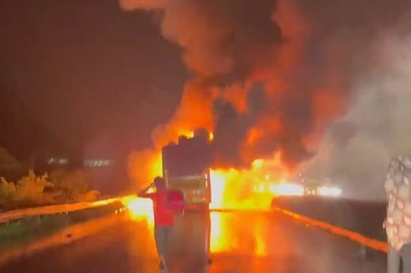 Passengers 'burn alive' after bus erupts in fireball after crash with ...