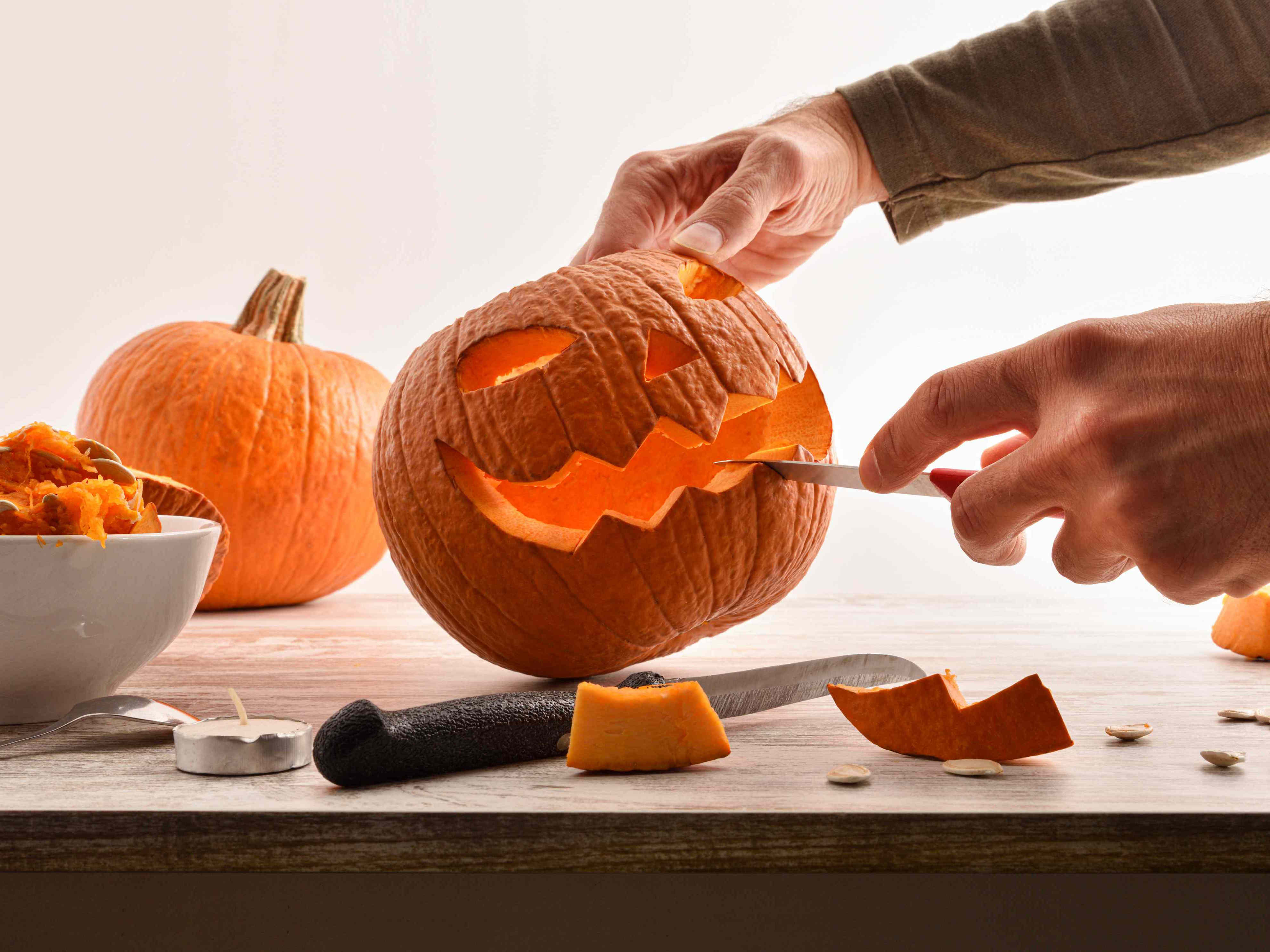Stop Hacking at Your Pumpkin—This Chef Trick Makes Carving Safer and ...
