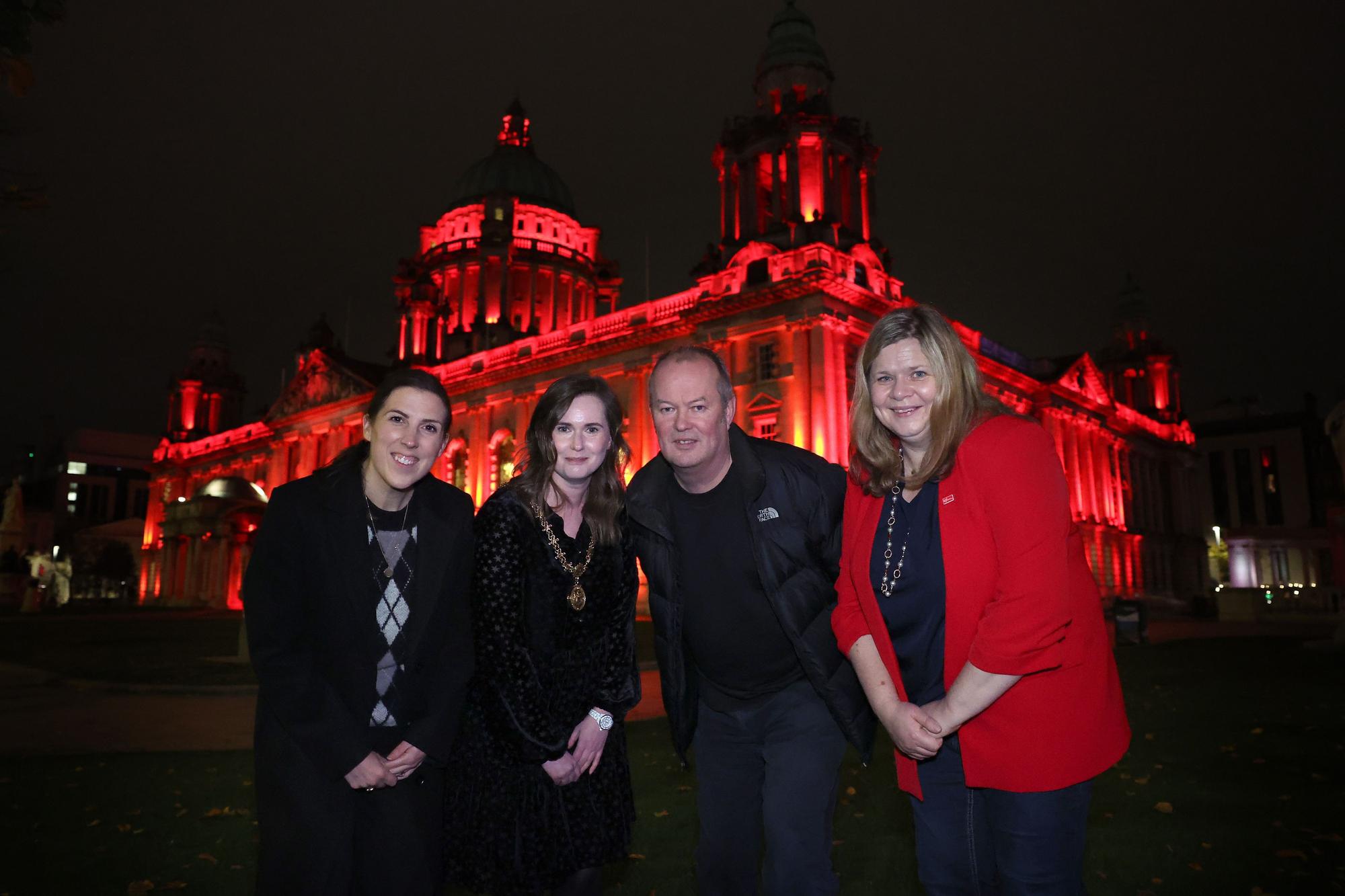 Belfast City Hall lights up red as comics stand up for integrated education