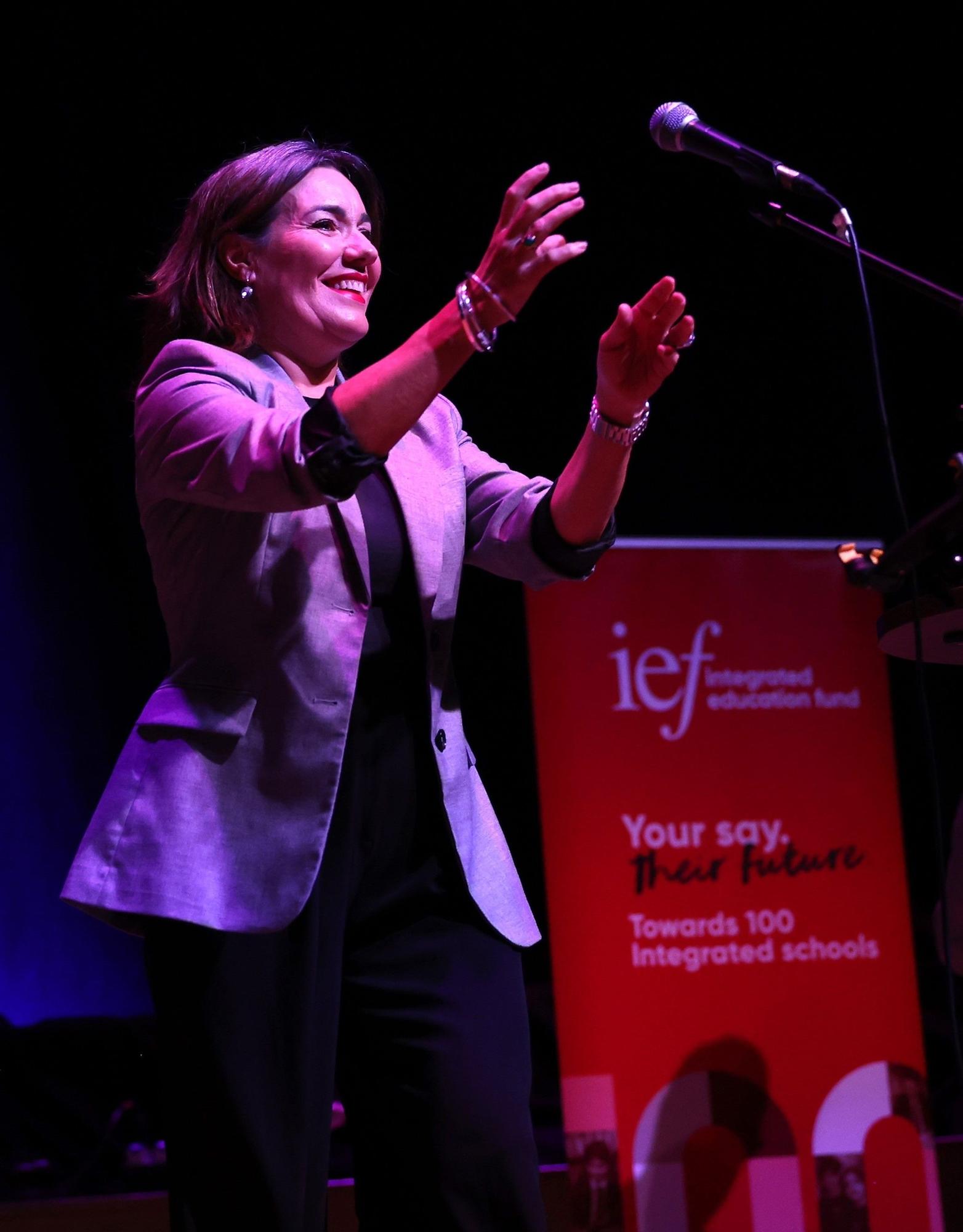 Belfast City Hall lights up red as comics stand up for integrated education