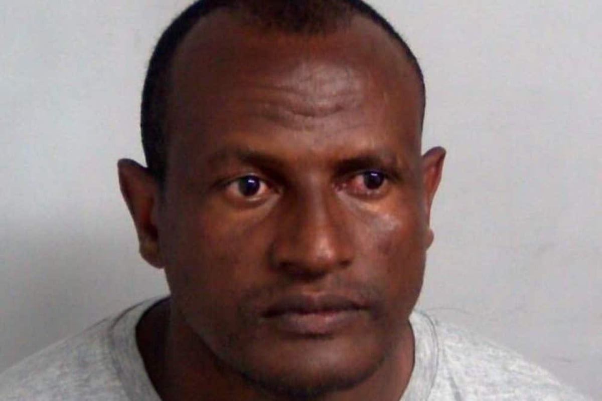 Asylum seeker freed in error from prison seen taking train to London