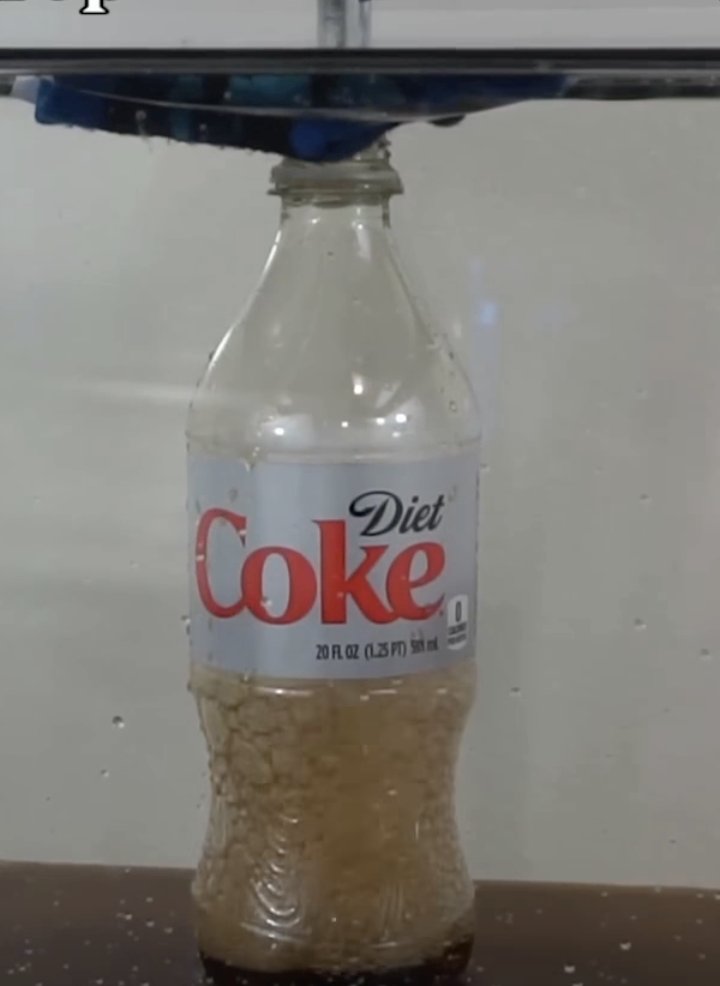 What happens when you drop Mentos in Coke… in a vacuum?