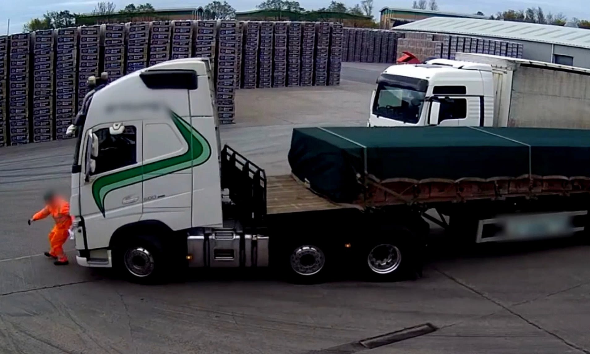 HGV driver who ploughed into factory boss trying to photograph his ...