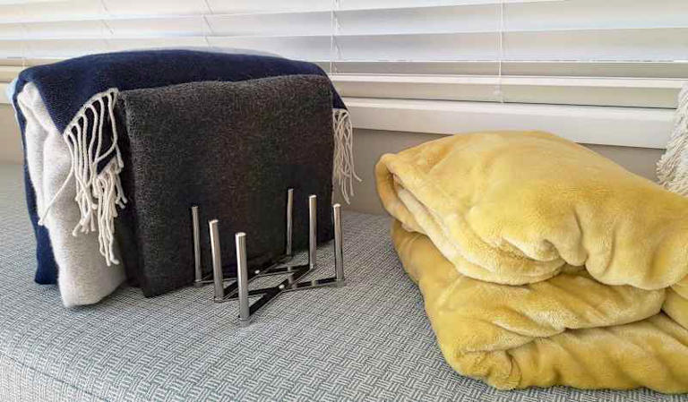 I Use a Lid Organizer to Store My Blankets, and It's Brilliant