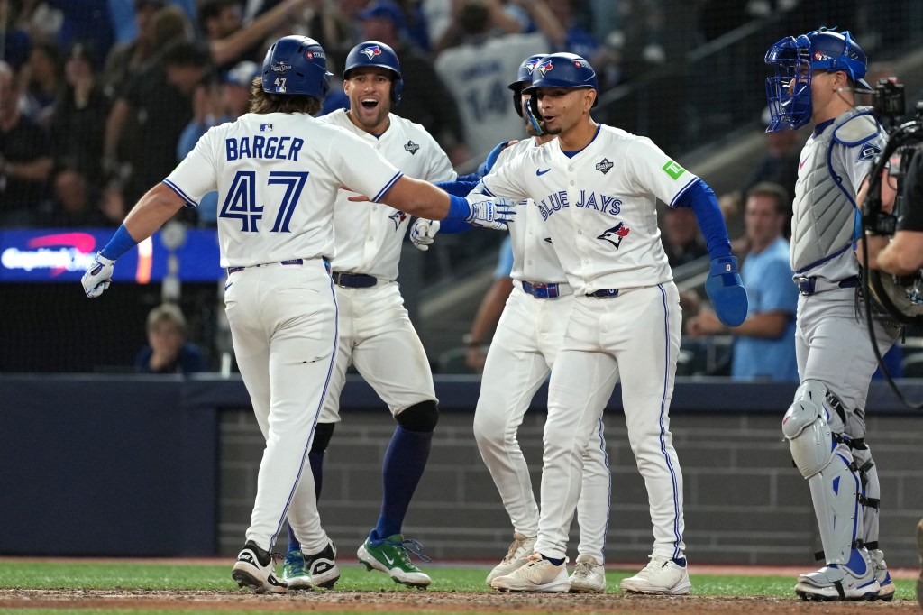 Addison Barger smacks historic grand slam in wild nine-run Blue Jays ...
