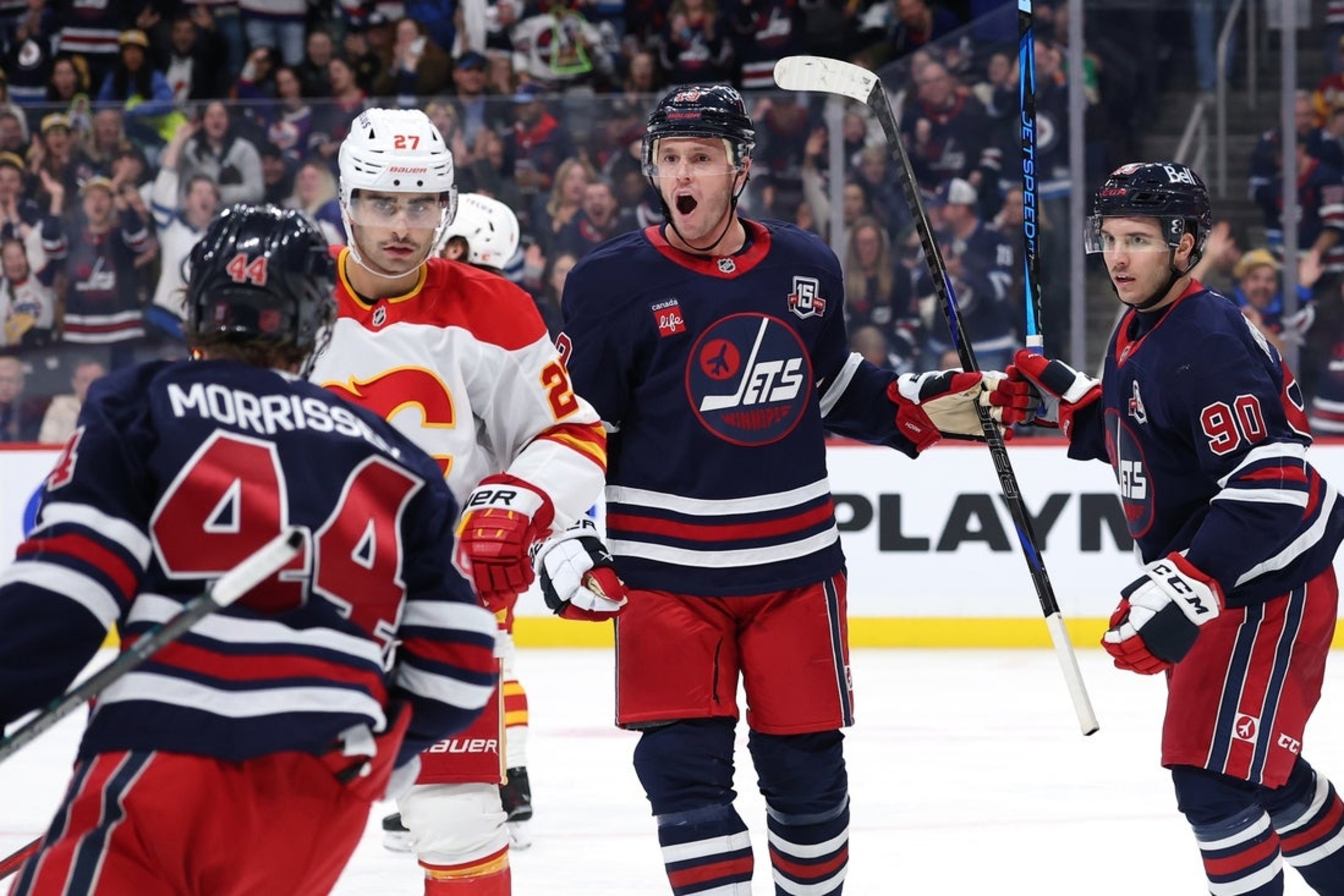Flames skid hits 8 games with loss to surging Jets