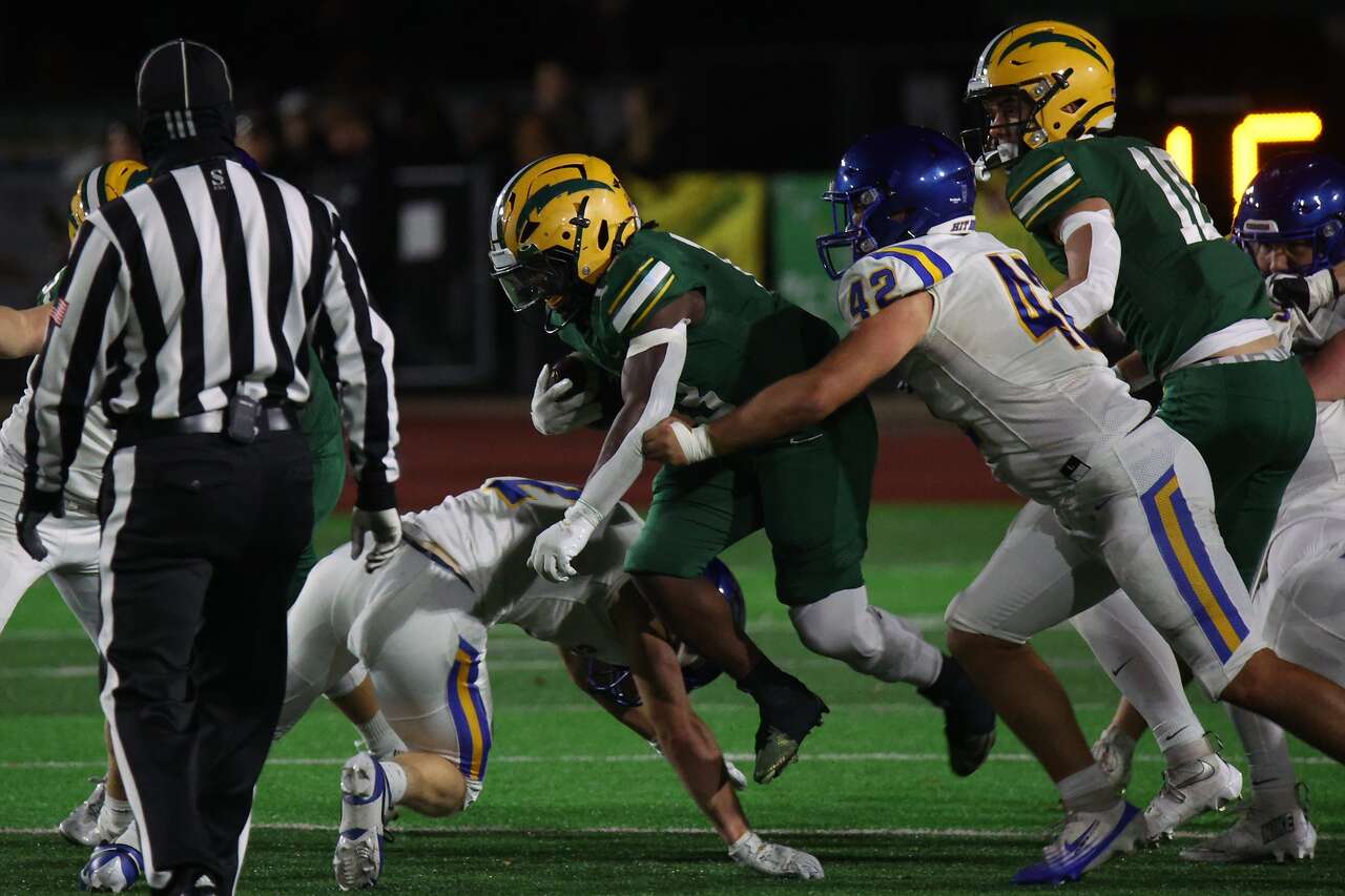 Dow beats Midland 34-7 behind Randolph's three TDs