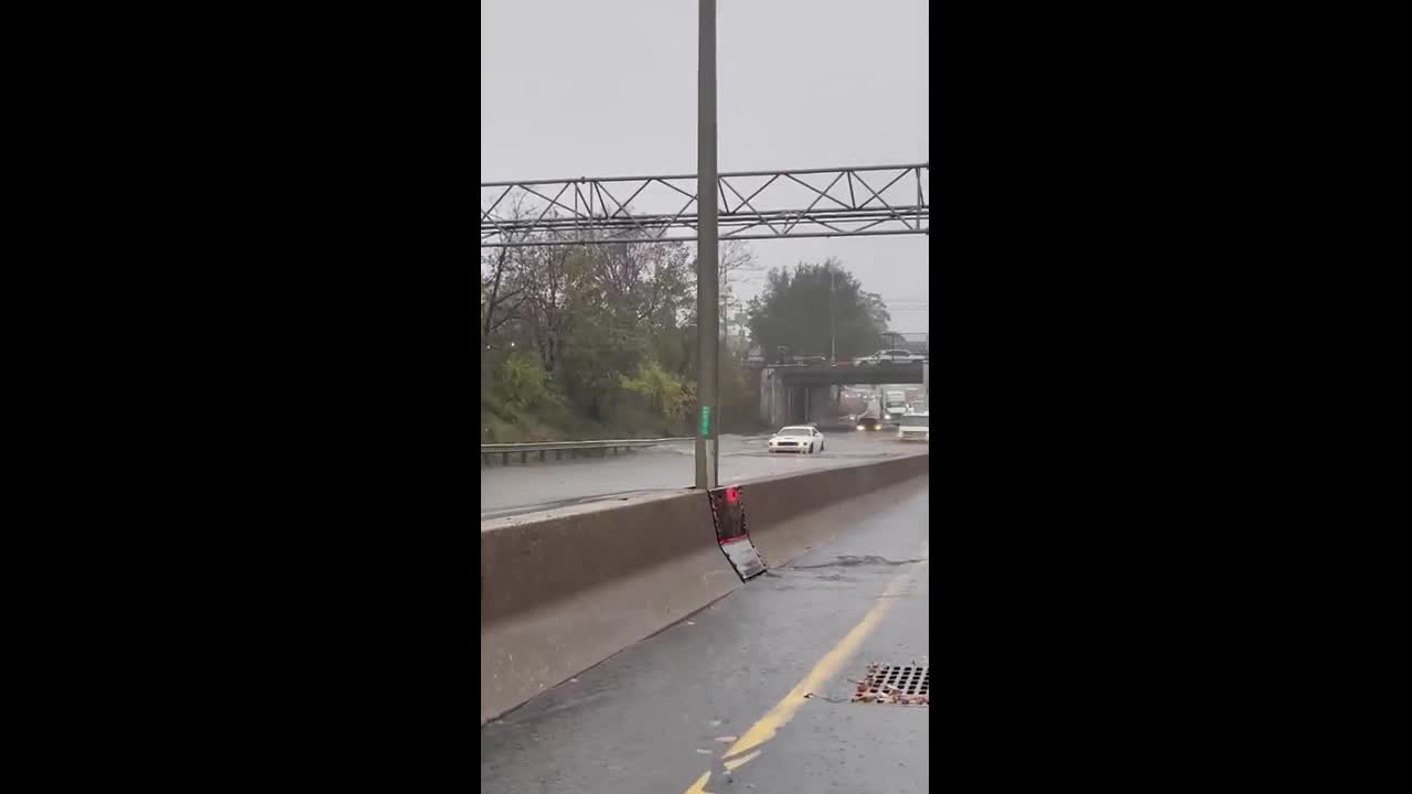 Heavy flooding submerges Long Island Expressway in Queens, New York