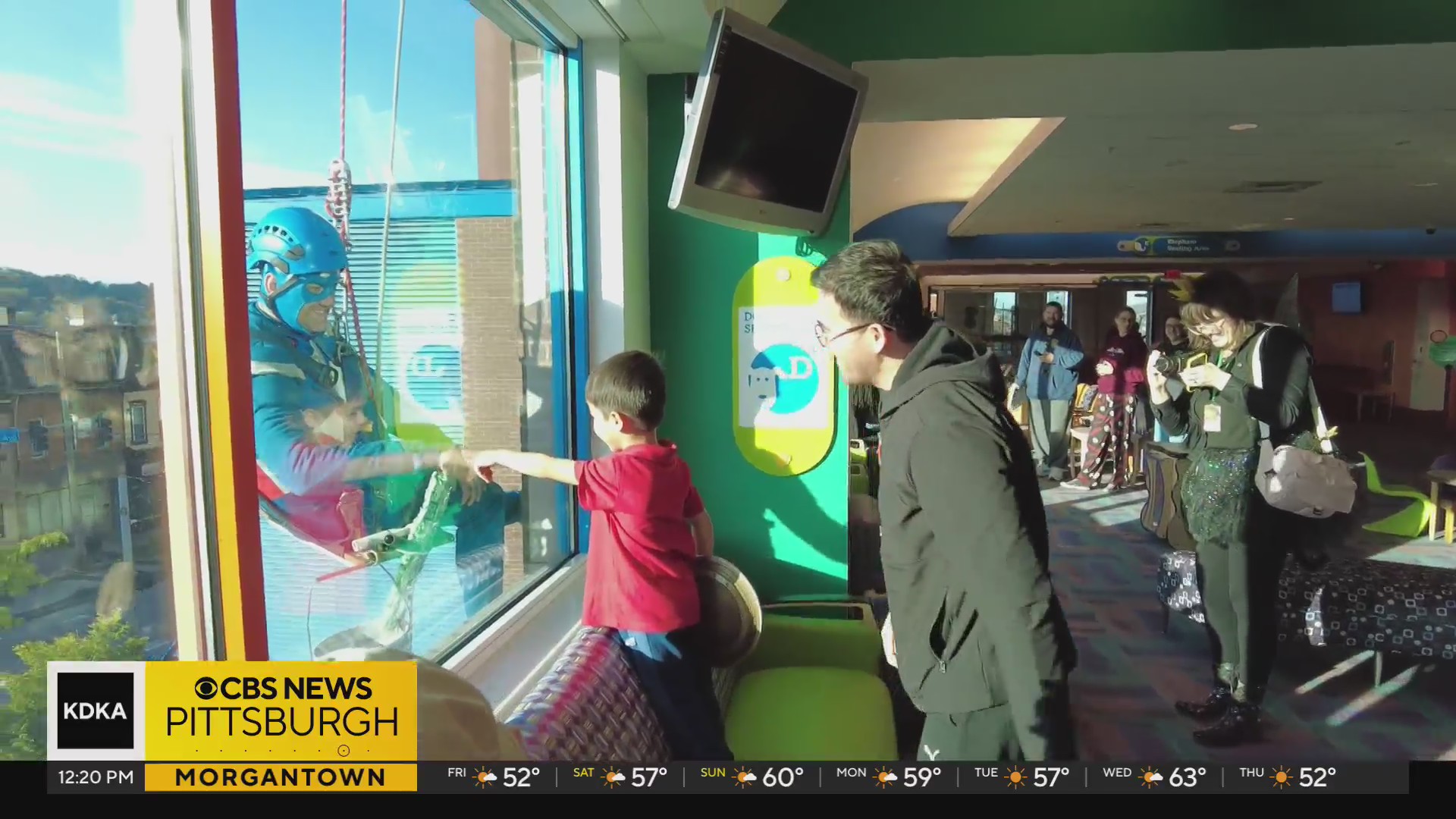 Superhero window washers return to UPMC Children's Hospital