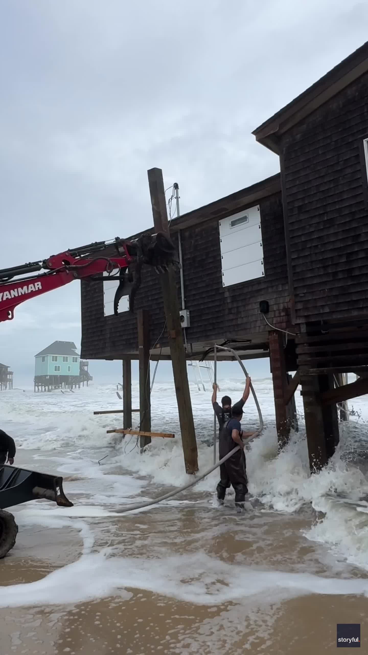 Workers Attempt to Save Battered Beachfront Home After 5 Nearby ...