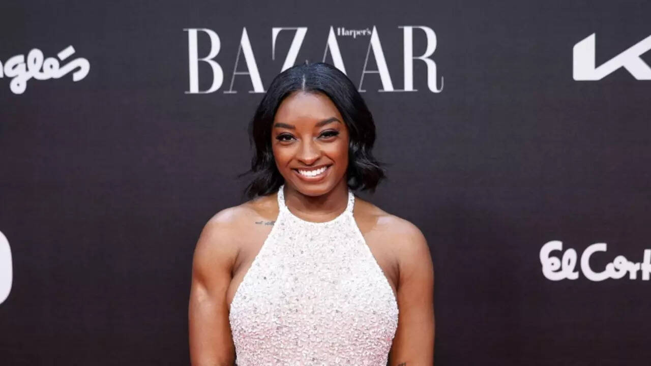 Jonathan Owens’ wife Simone Biles wows in shimmering silver look at ...