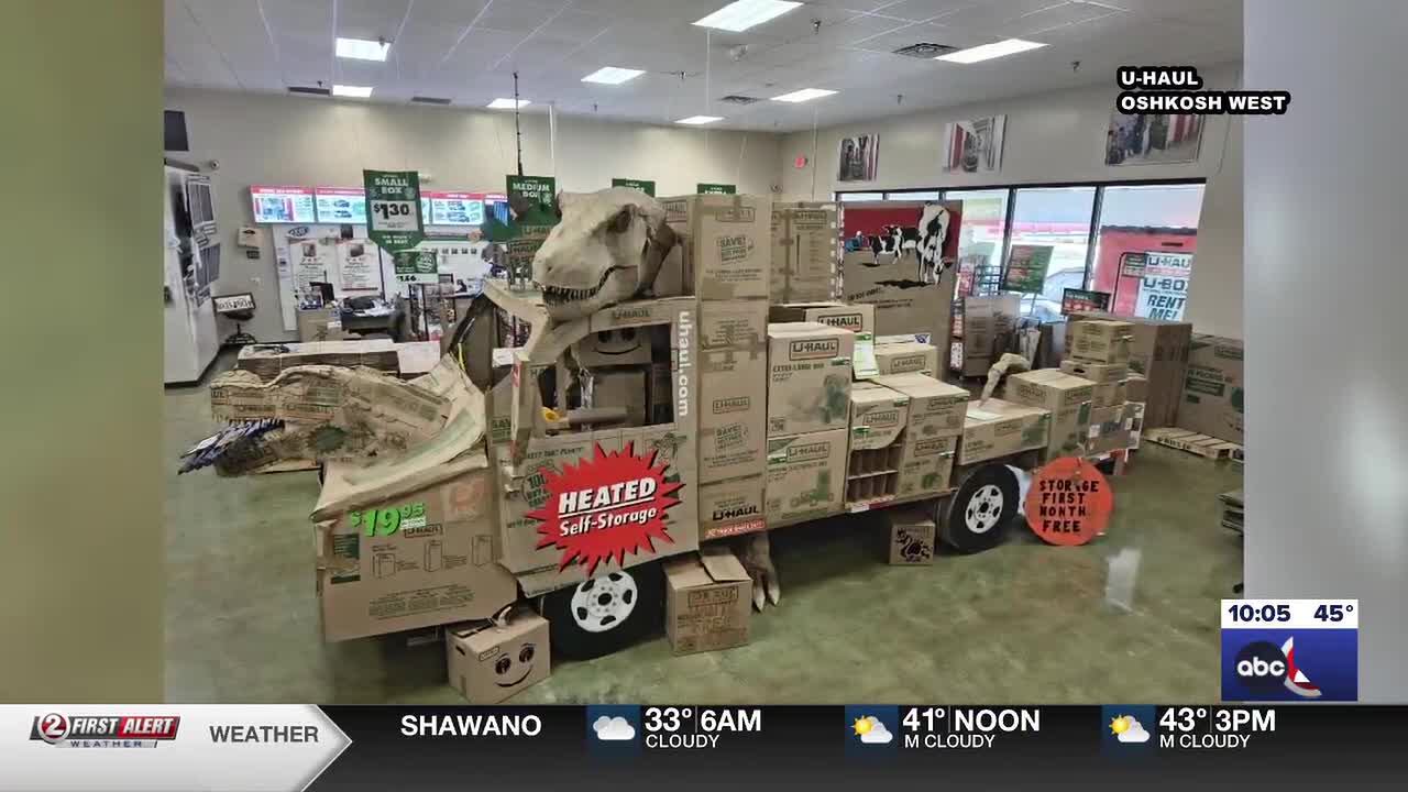 Oshkosh West U-Haul employees build ‘U-Haul-o-saurus Truck’ for Halloween