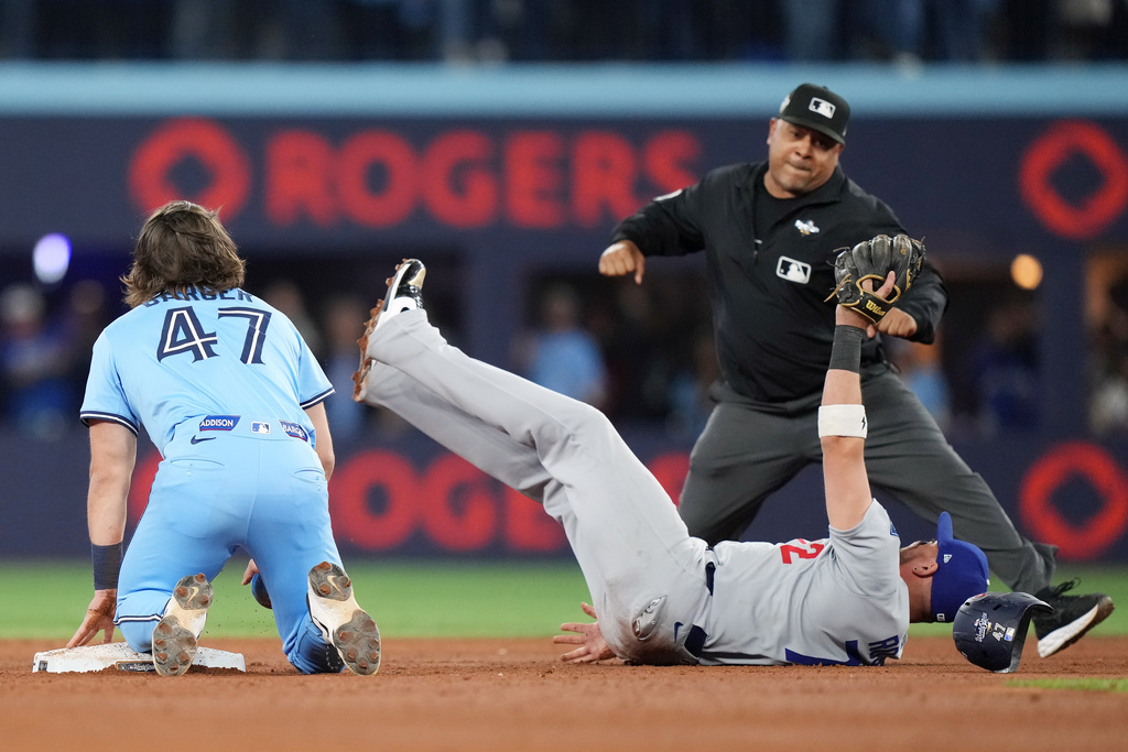 Double trouble: Barger gets caught off second base as Blue Jays' rally ...
