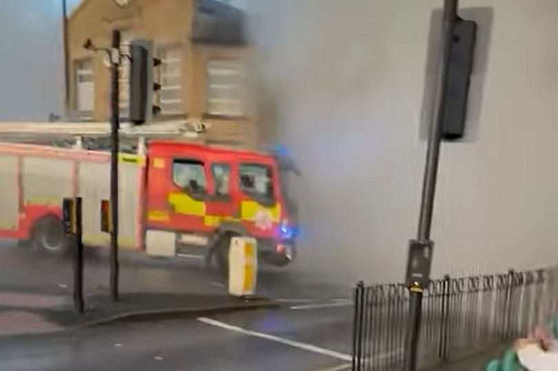 Thick smoke billows from takeaway as crews tackle fire on Greater ...