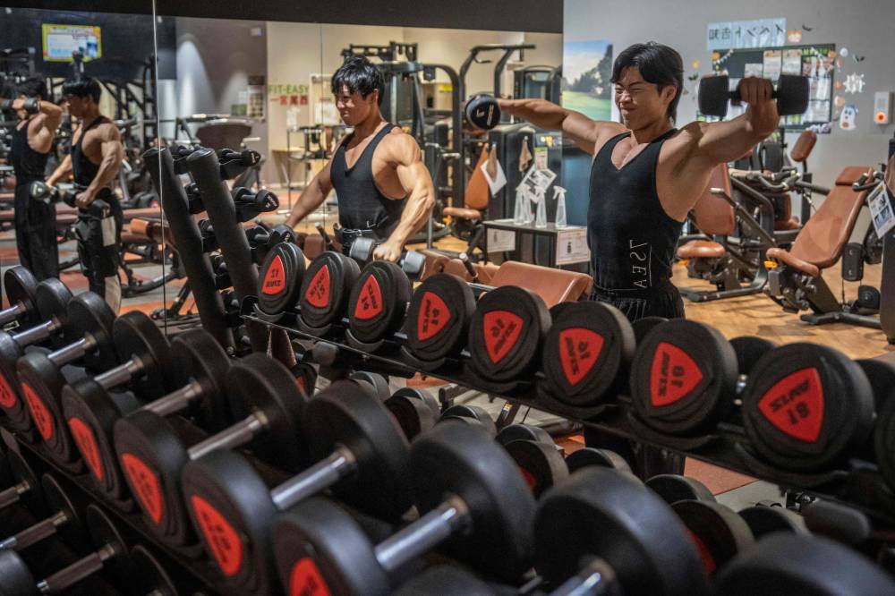 Young bodybuilders lift Japan's ailing care sector