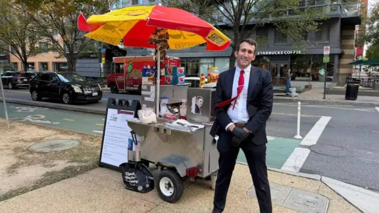 Viral on Instagram: US lawyer sells hot dogs in office suit amid ...