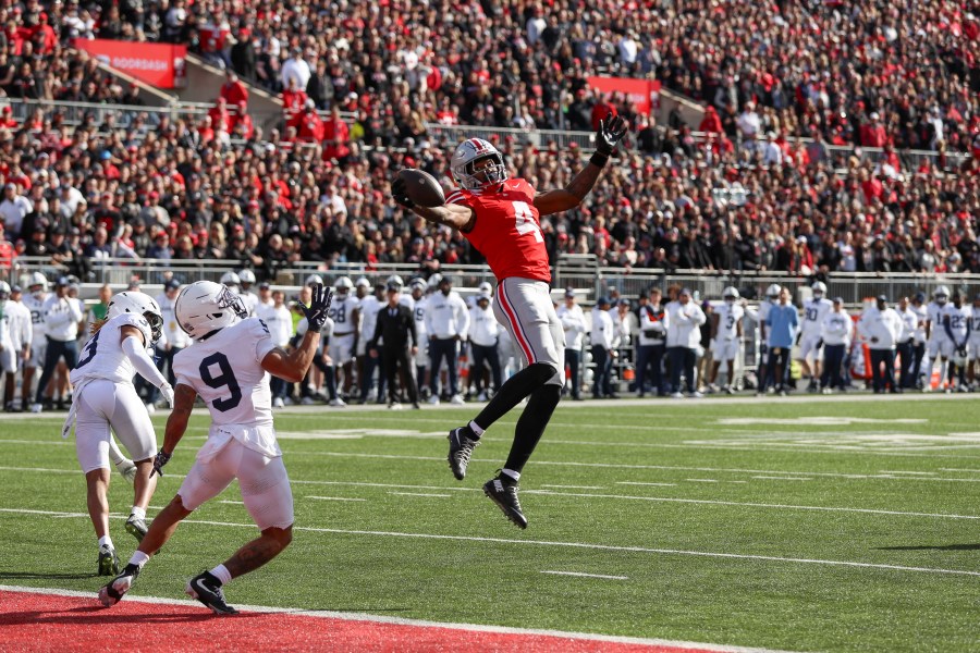 No. 1 Ohio State pulls away from Penn State 38-14 to stay unbeaten