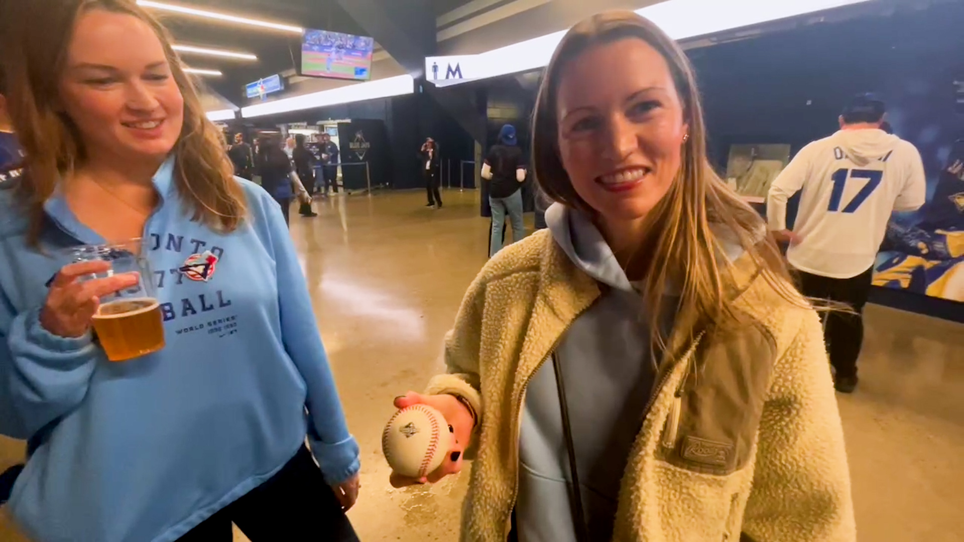 Roots CEO Meghan Roach catches Bo Bichette's Game 7 home run ball