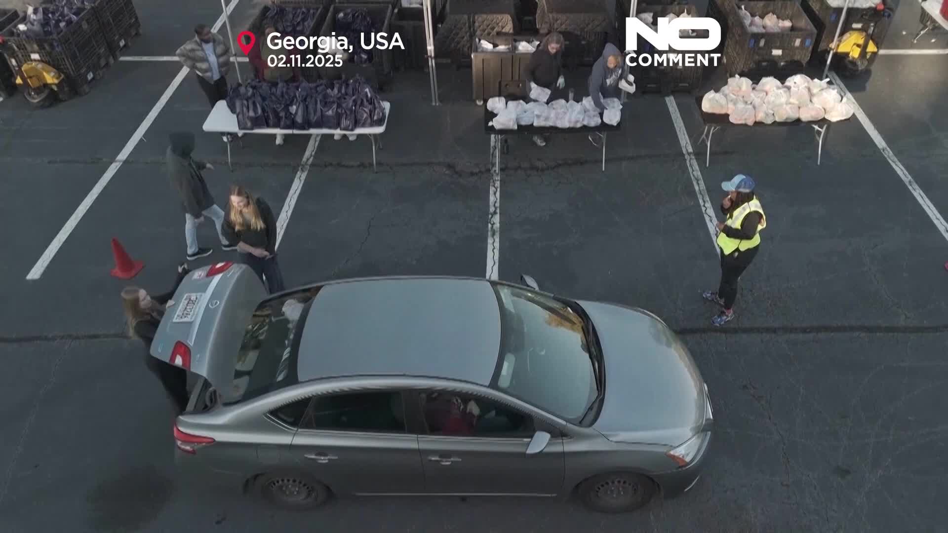 US food stamp cuts: hundreds line up for food aid as funding freeze nears