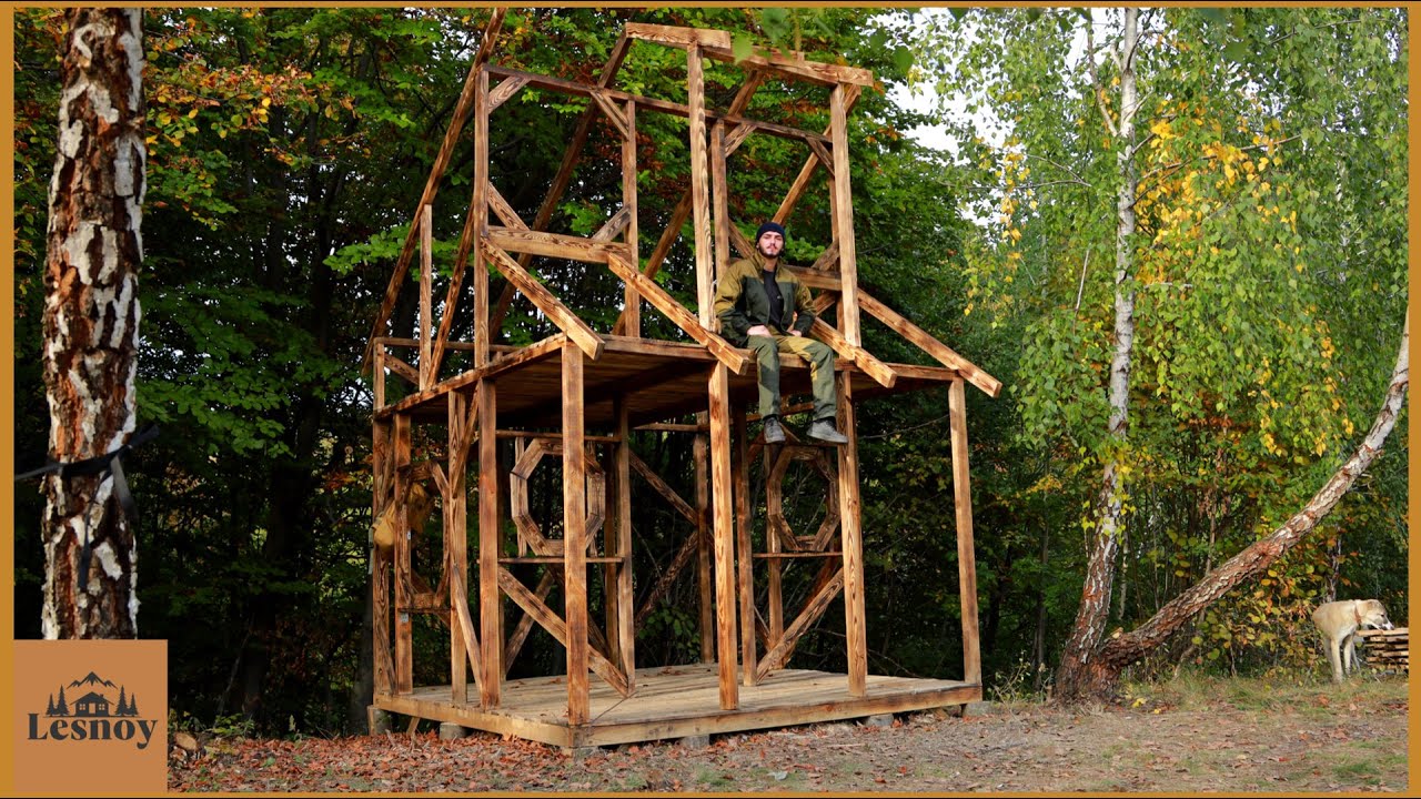 Construction of a two-story house from a tree. DIY