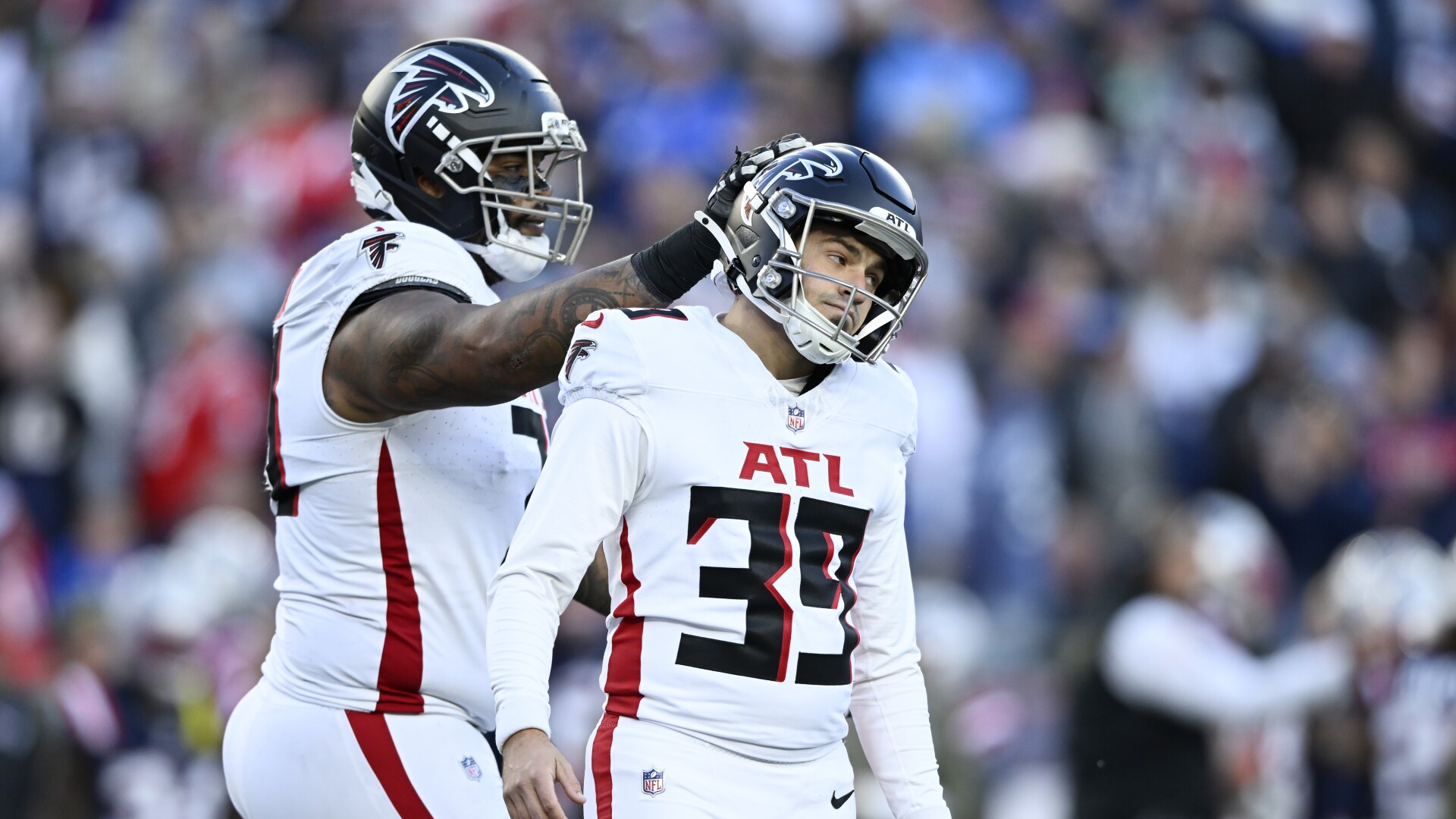 Falcons miss an extra point, Patriots hold on for a 24-23 win
