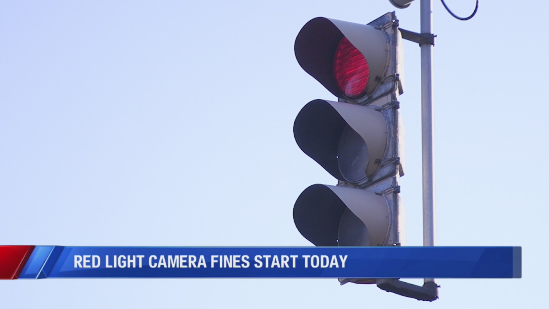 Syracuse starts issuing fines for running red lights