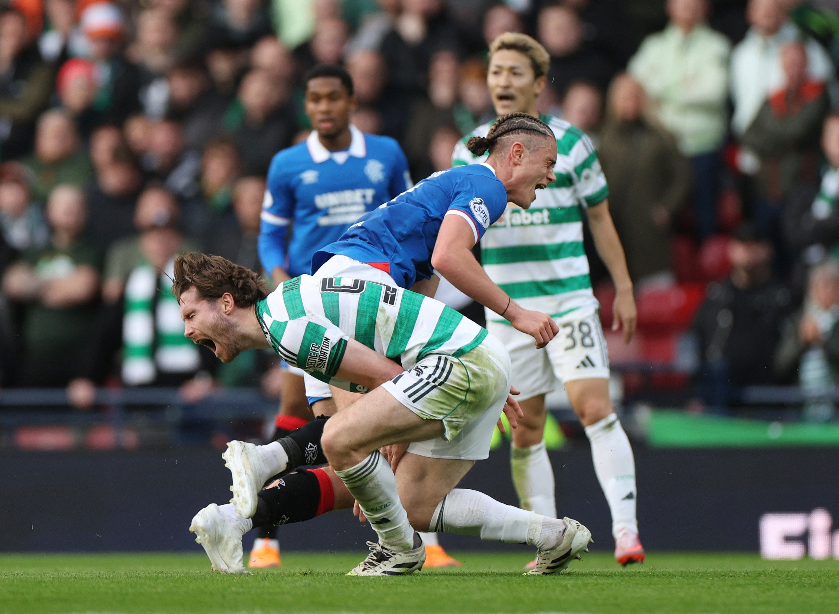 Celtic beat 10-man Rangers in extra time to reach League Cup final