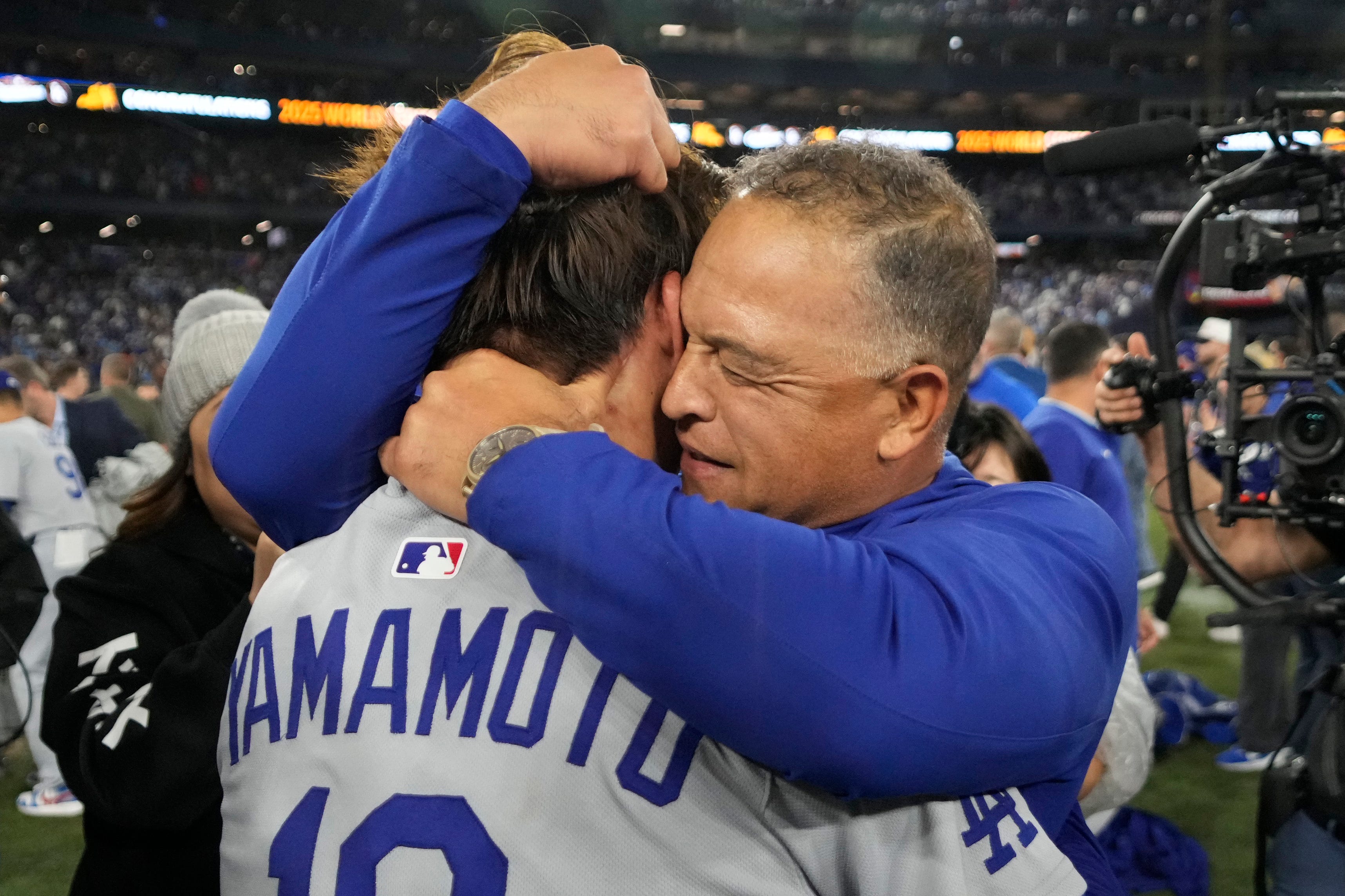 UCLA's Dave Roberts makes history, wins back-to-back World Series ...