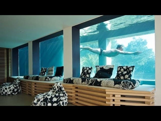 Villa on the rocks with 91-foot aquarium pool