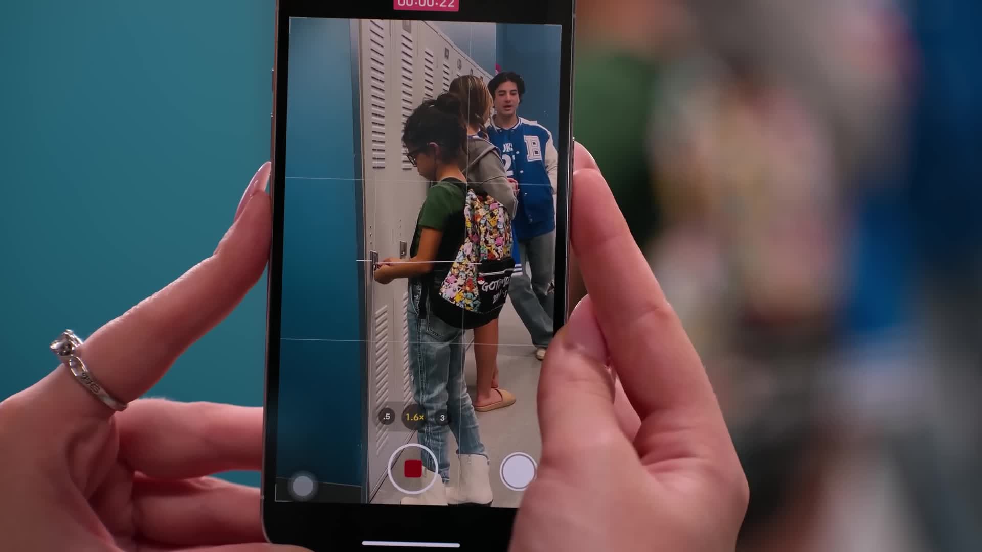 Teacher hides her face at school