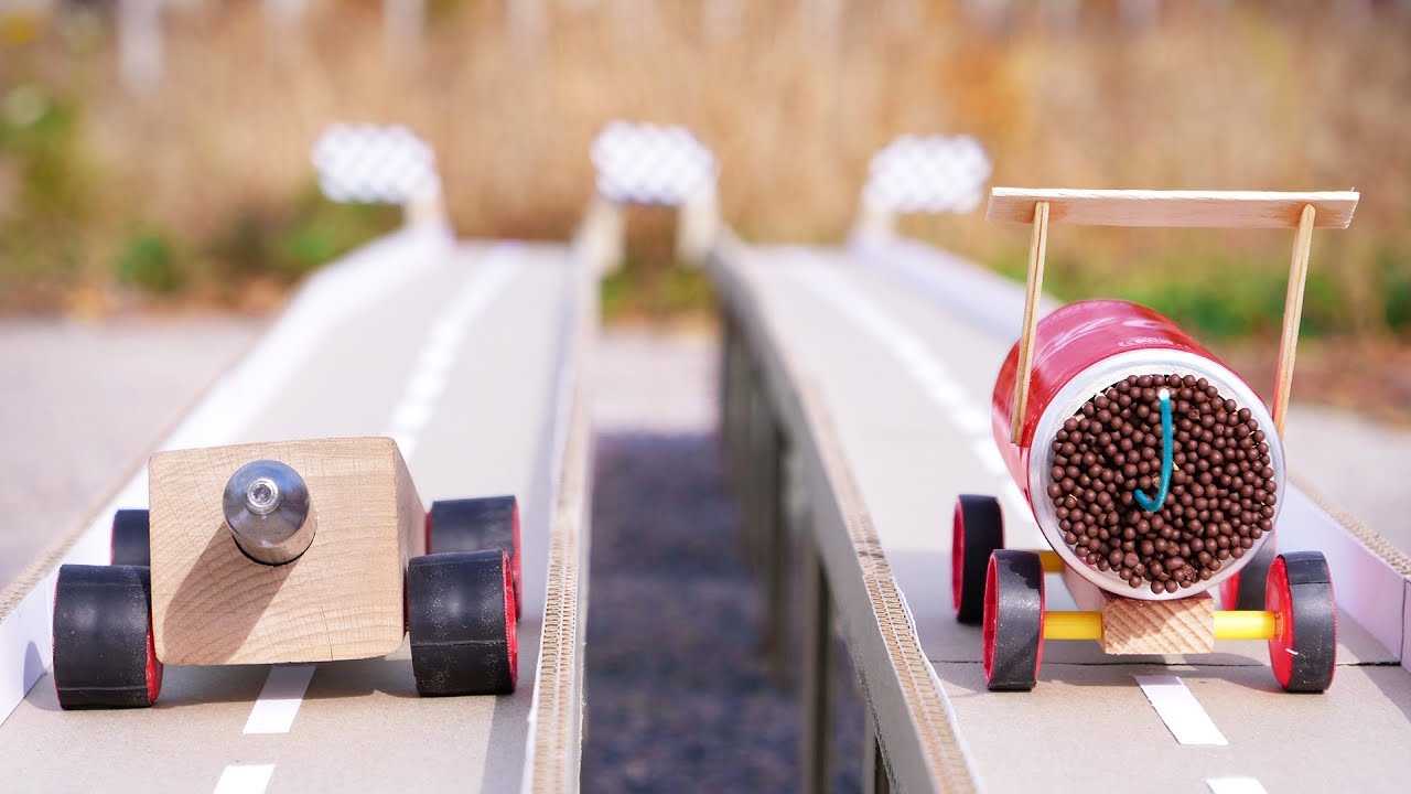 Drag racing CO2 powered car vs supercharged Coke can