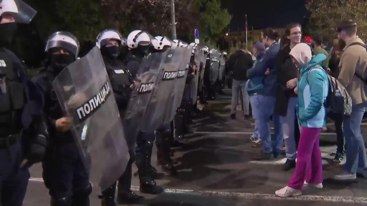 Riot police separate opponents, loyalists of Serbia's president as ...