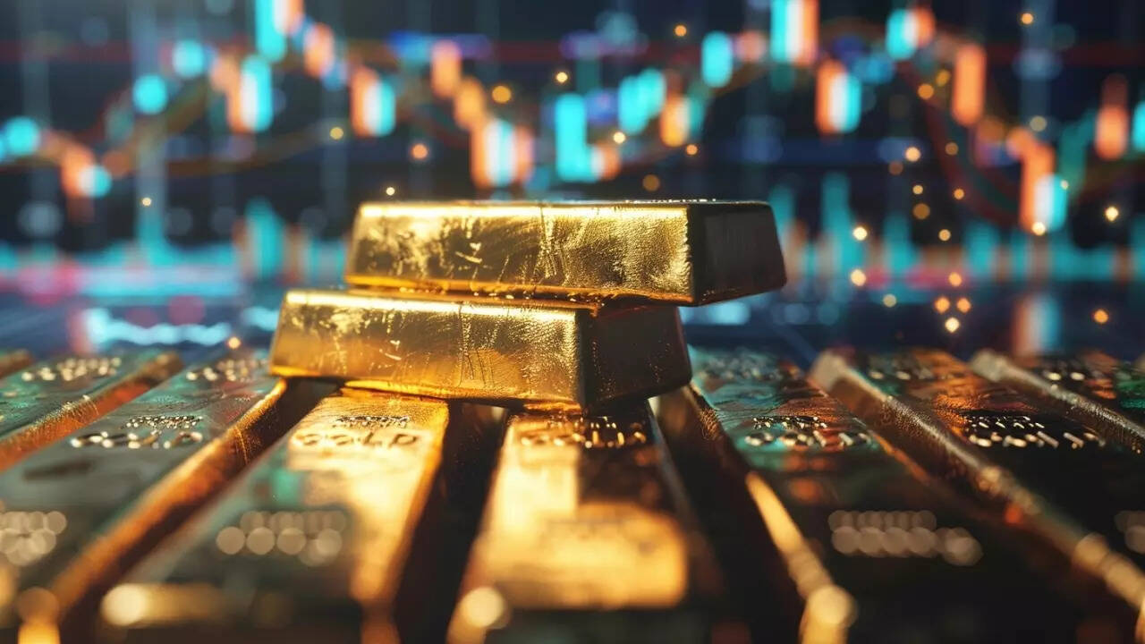 Gold falls on stronger dollar as investors trim rate-cut bets