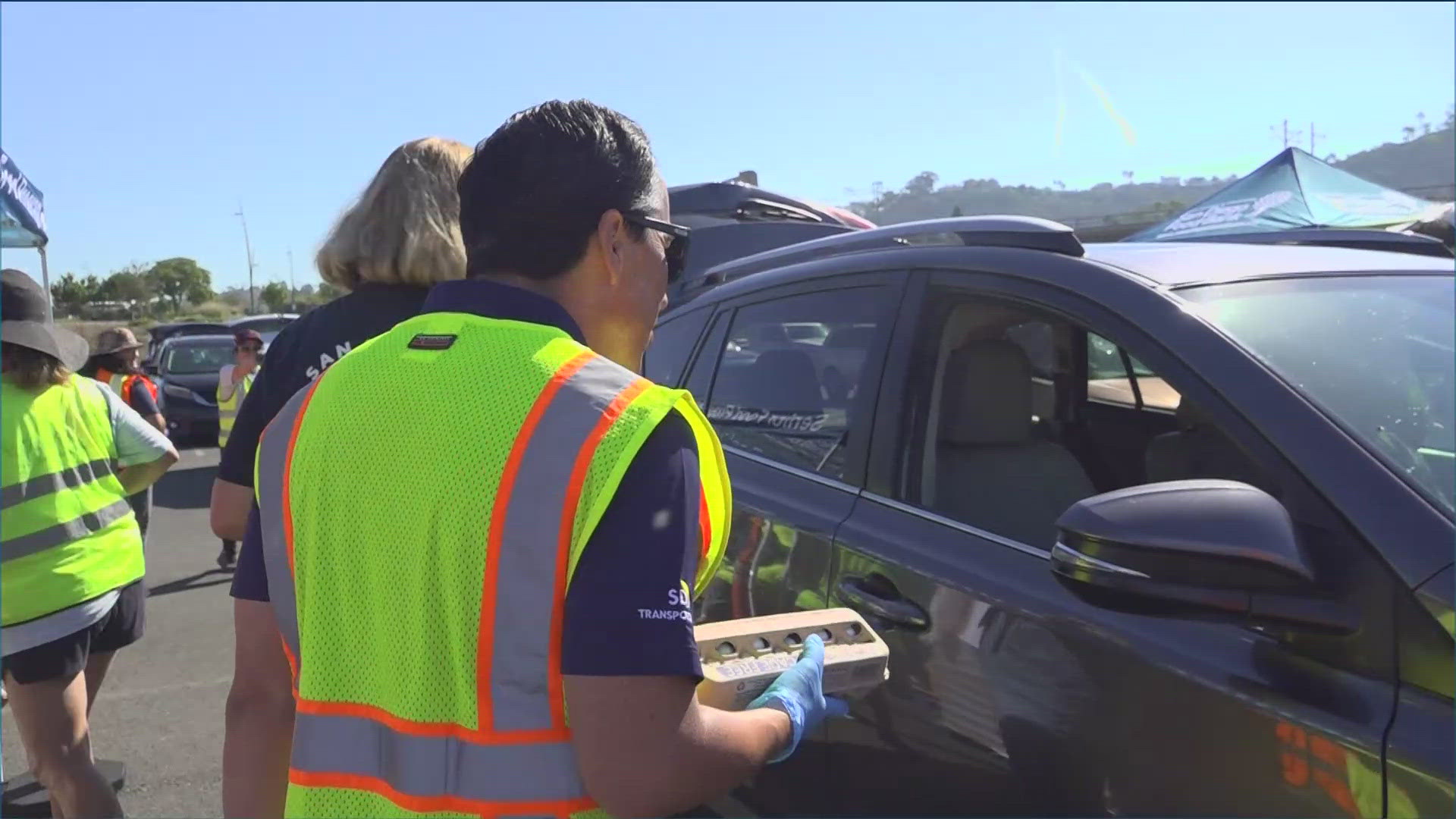 Thousands gather at emergency food distribution at Snapdragon Stadium