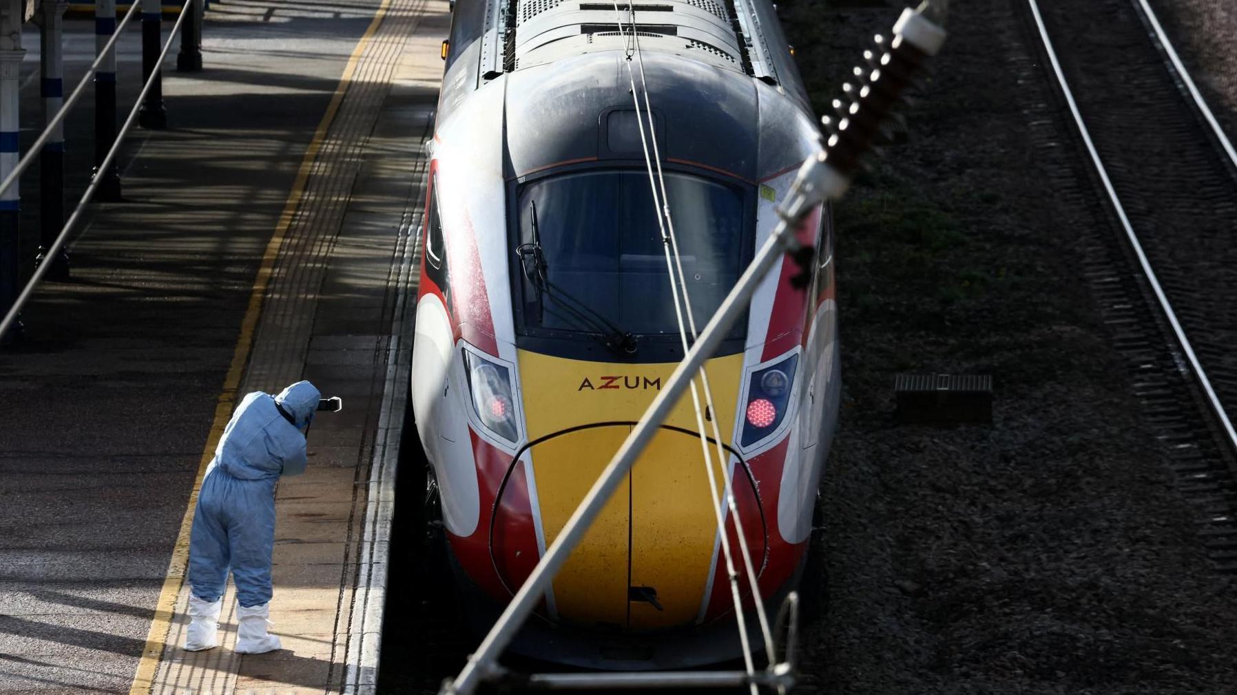 'Heroic' train worker in life-threatening condition after knife attack ...