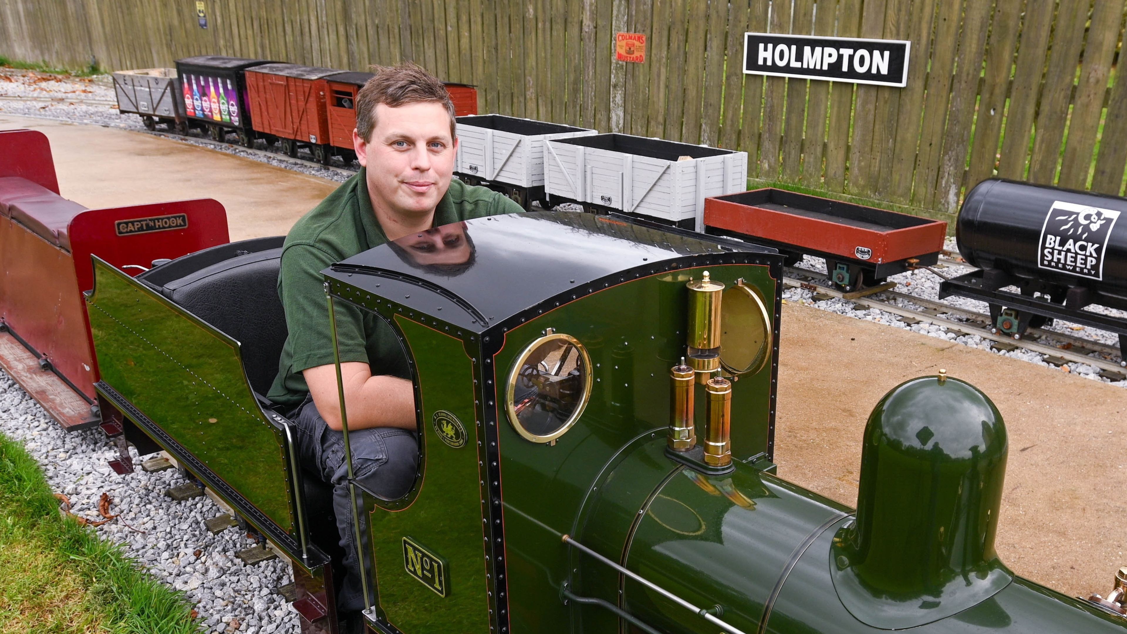 Train buff builds huge working miniature railway in his back garden