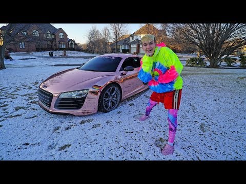 Expensive supercar drives through deep snow during winter challenge