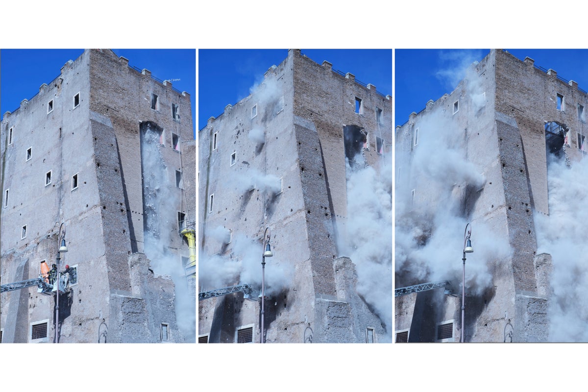 A Rome medieval tower partially collapses, badly injuring a worker and ...