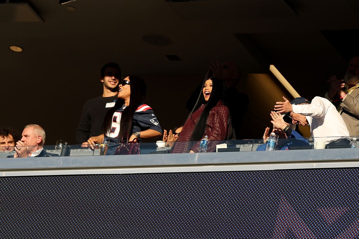 Cardi B debuts as NFL WAGs: Pregnant rap star lights up as Stefon Diggs ...