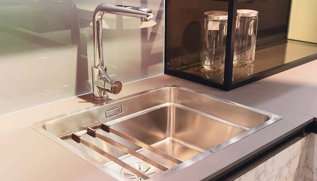 Handyman demonstrates simple method to fix clogged garbage disposal ...