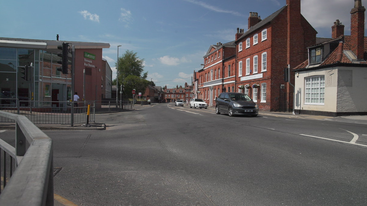 Man charged with murder after driver died at roadside