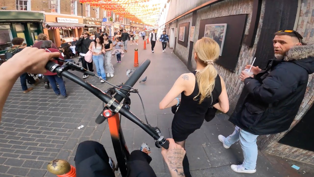 Wheelie through China Town from POV angle