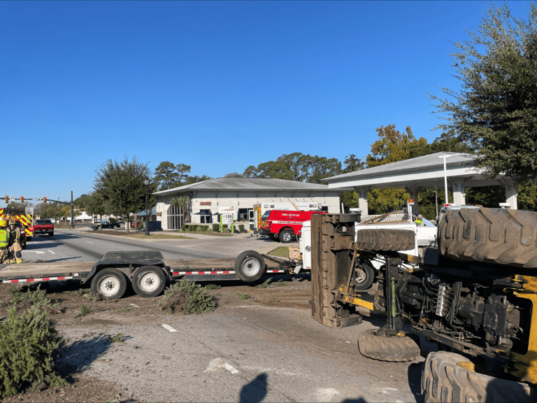 Beaufort Port Royal Fire Department on the scene of an overturned backhoe