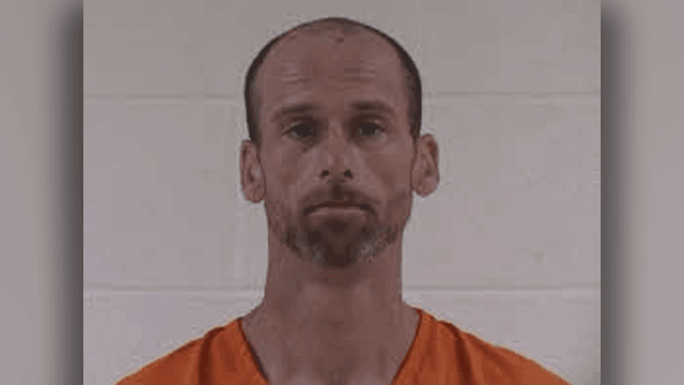 Murder warrant issued for man after woman's body found in Yancey County