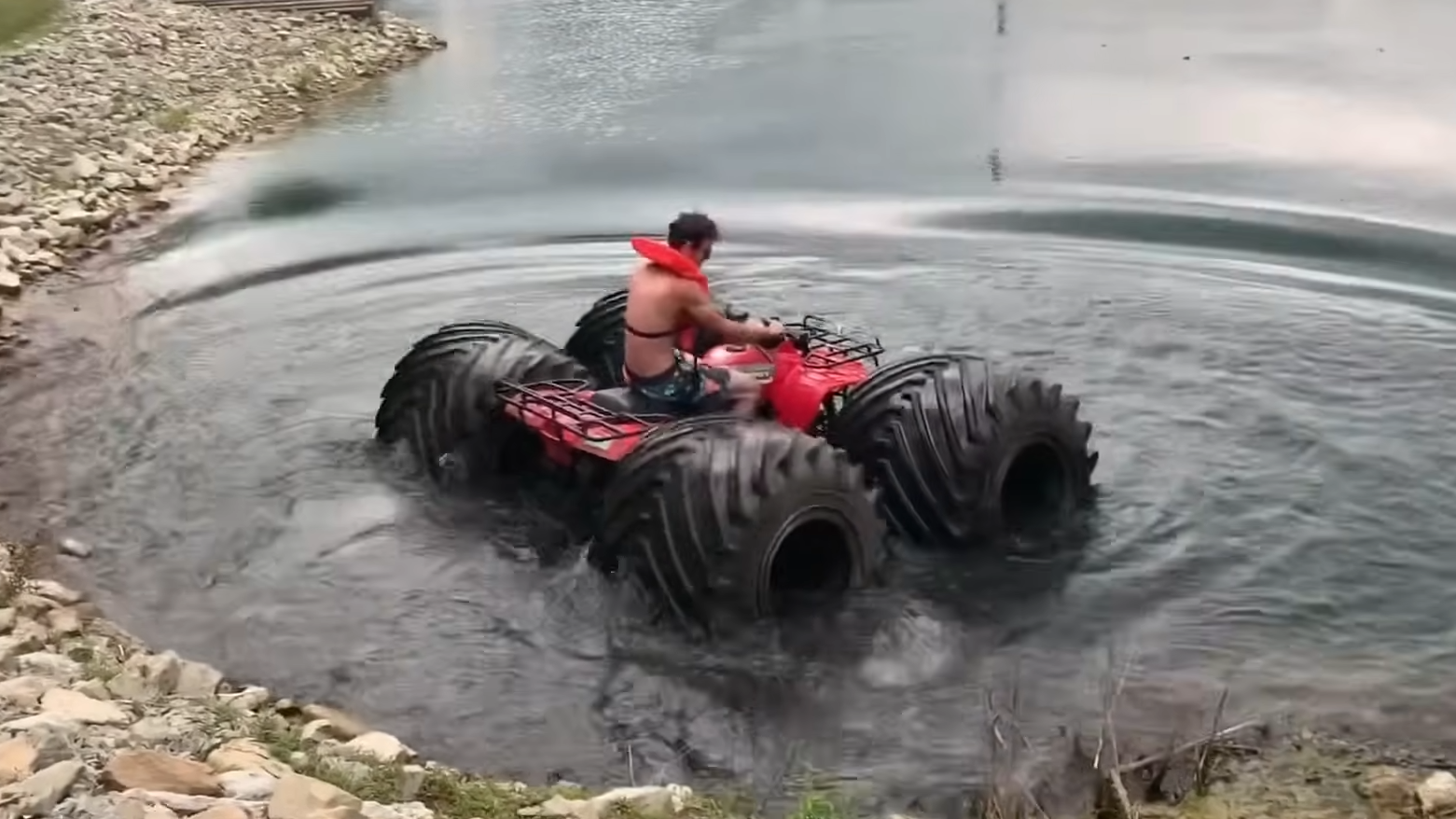 We Tried to Drive a Fourwheeler Across a 90-Foot Pond