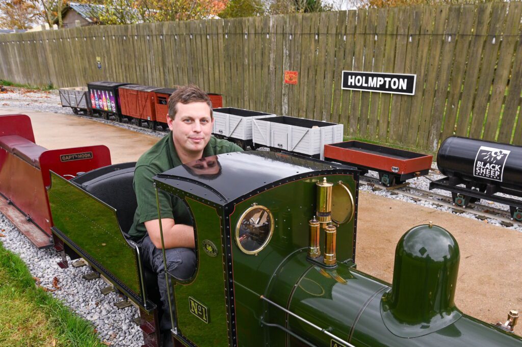 Train enthusiast builds huge working miniature railroad track in his ...