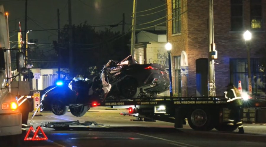 Car trapped under tractor-trailer in Birmingham