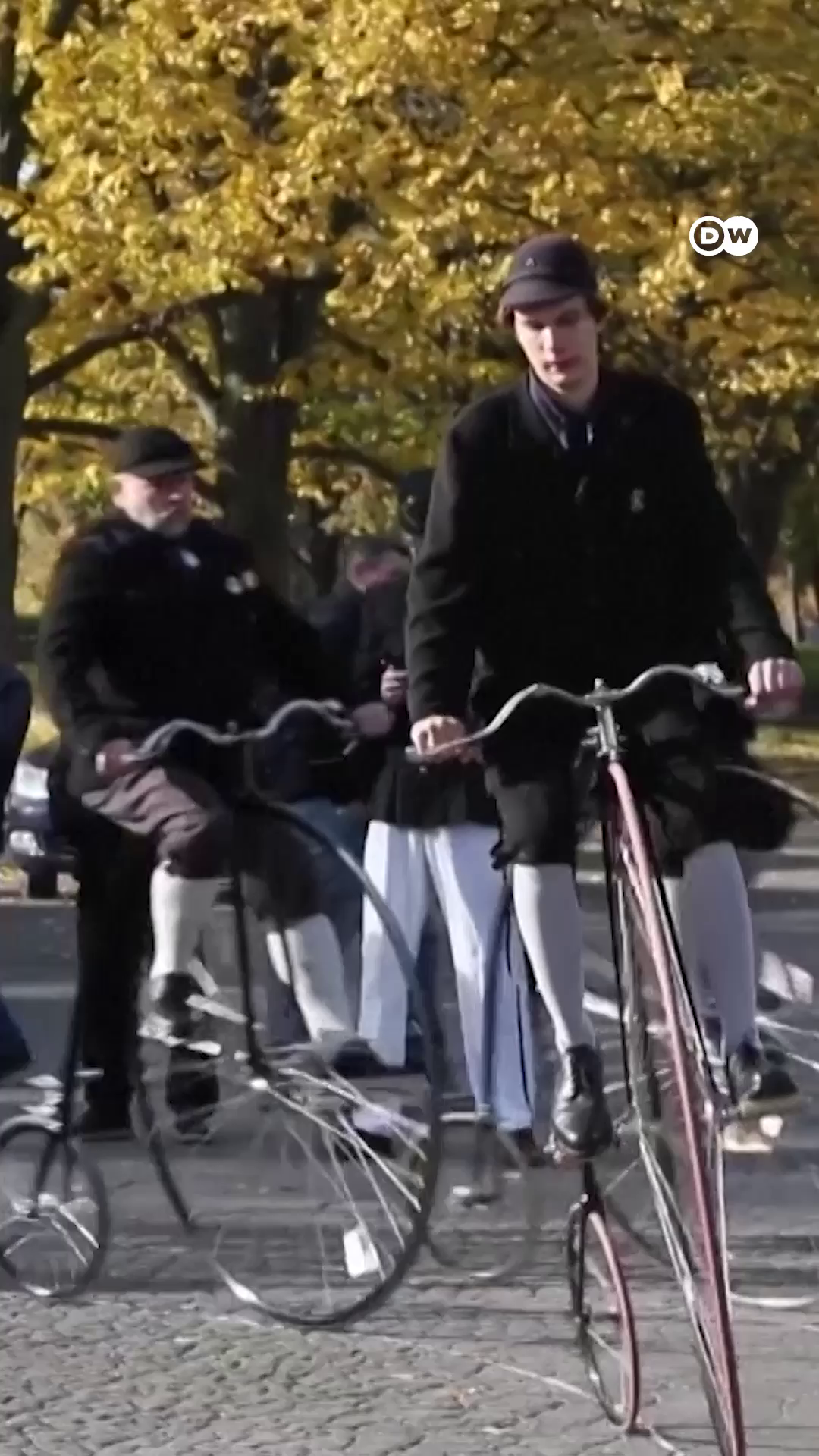 Penny-Farthing enthusiasts ride through Prague